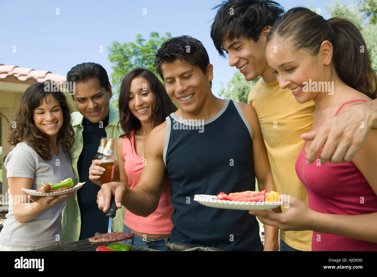 Group people gathered around hi-res stock photography and images - Alamy