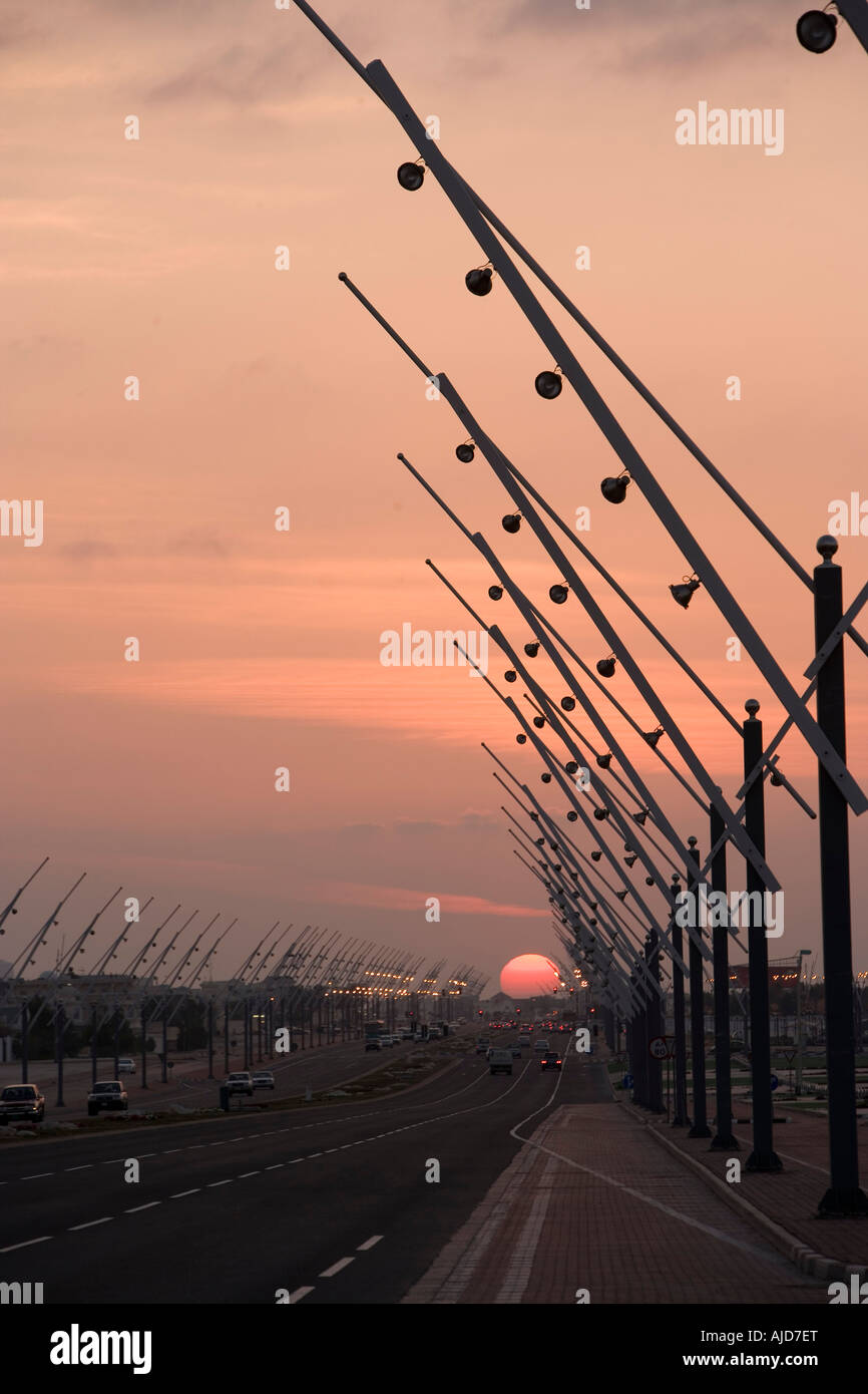 Street in Qatar at sunset Stock Photo - Alamy