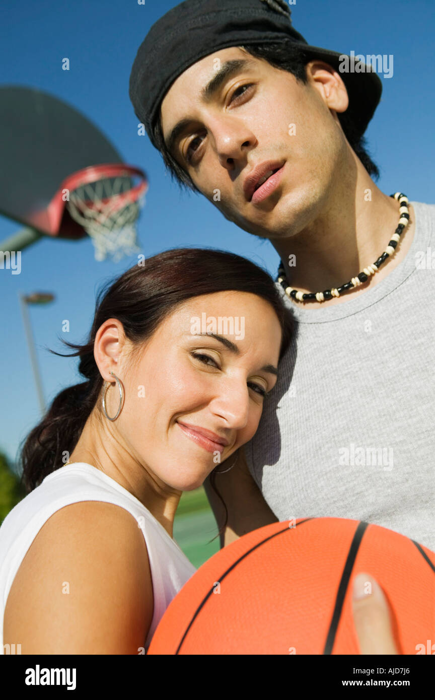 Couple at Basketball Court Stock Photo - Alamy
