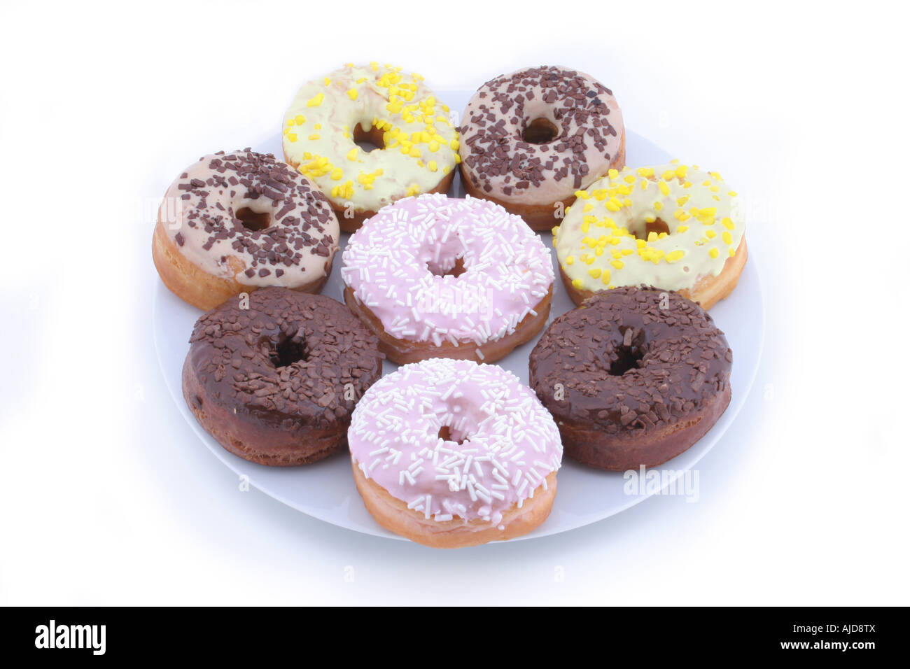 Iced doughnuts on a white studio background Stock Photo - Alamy