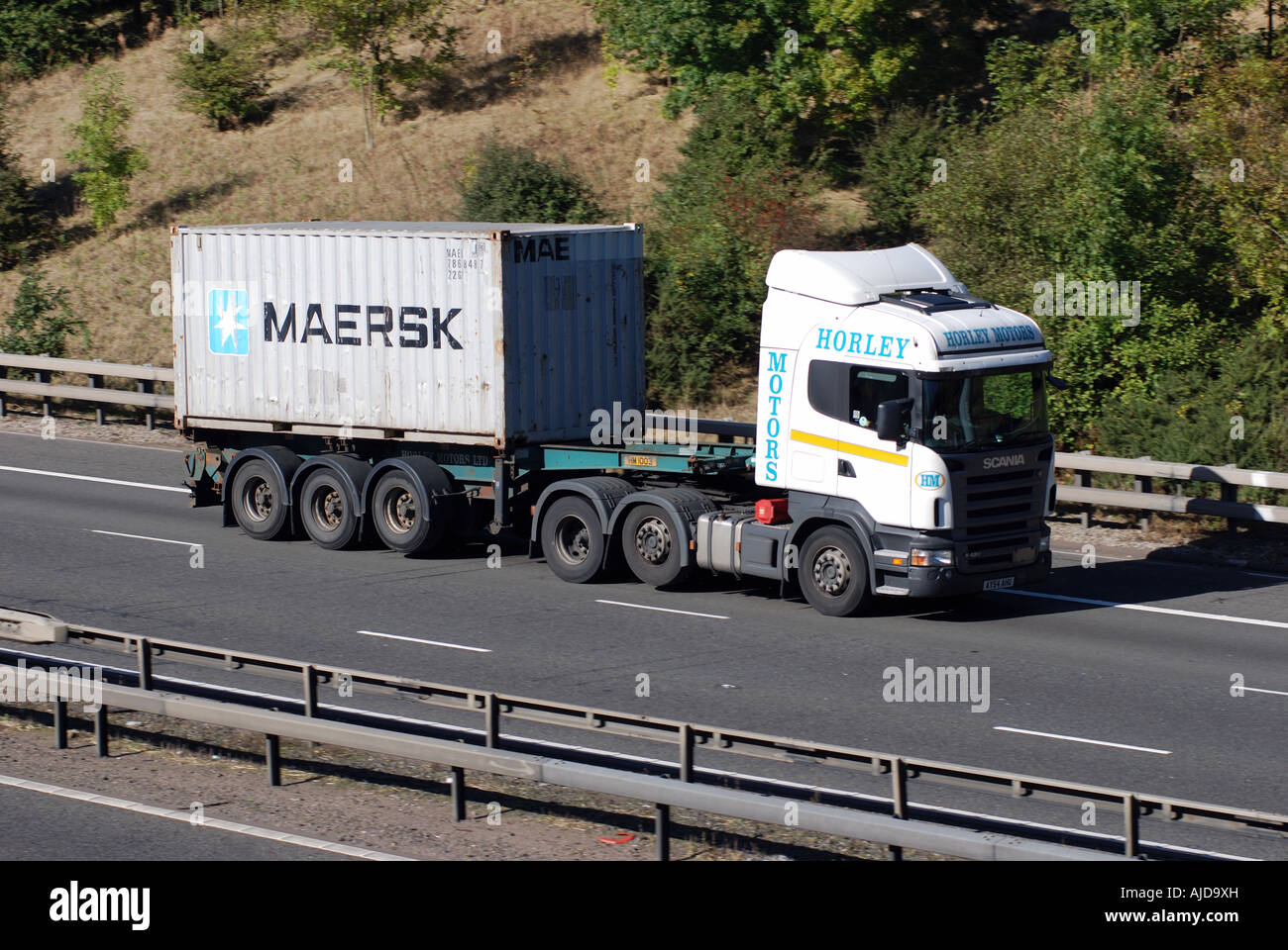 Lorry transporting Maersk container on M6 motorway, Warwickshire ...
