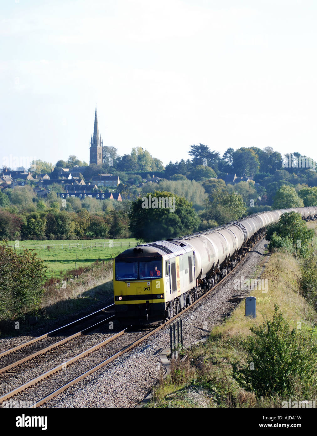 Class 60 diesel locomotive pulling oil train near King`s Sutton ...