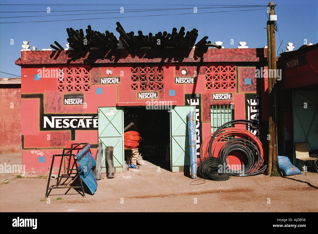 Globalisation advertising hoarding used as decoration retro signs for ...