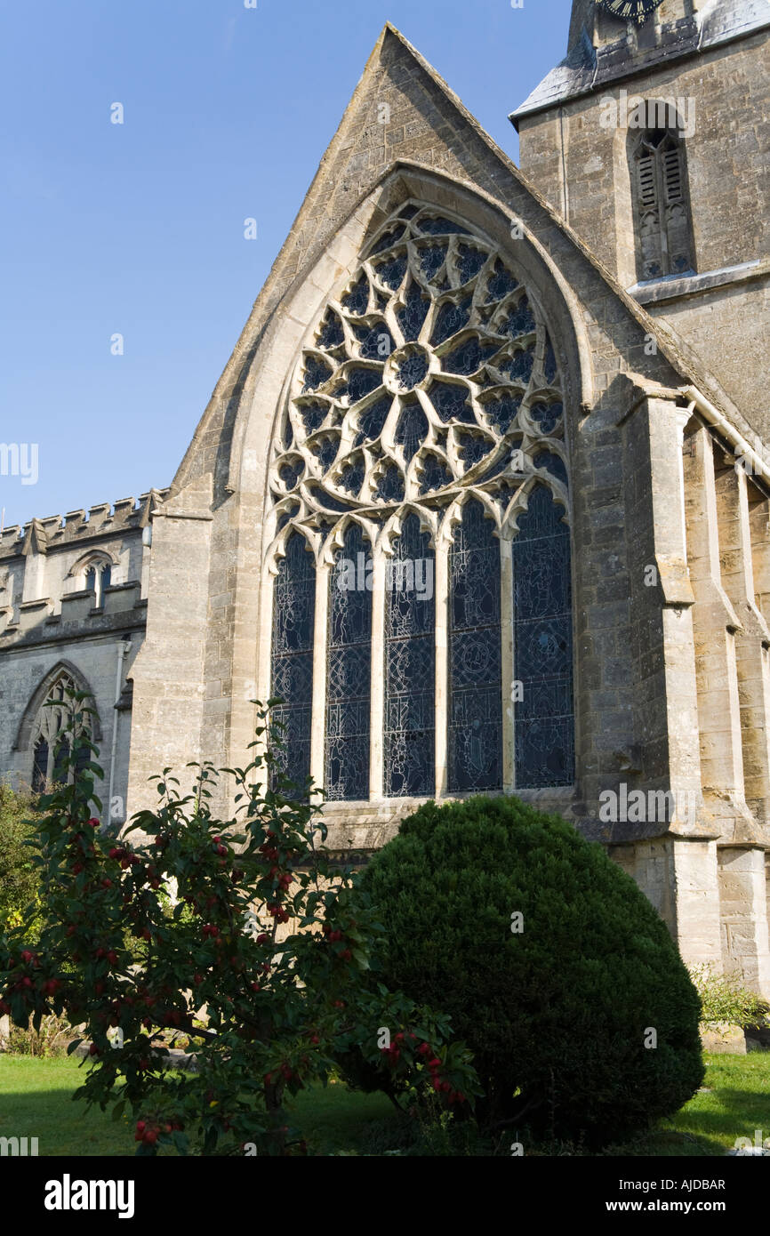 The Decorated period rose window in Holy Trinity church in the Cotswold ...