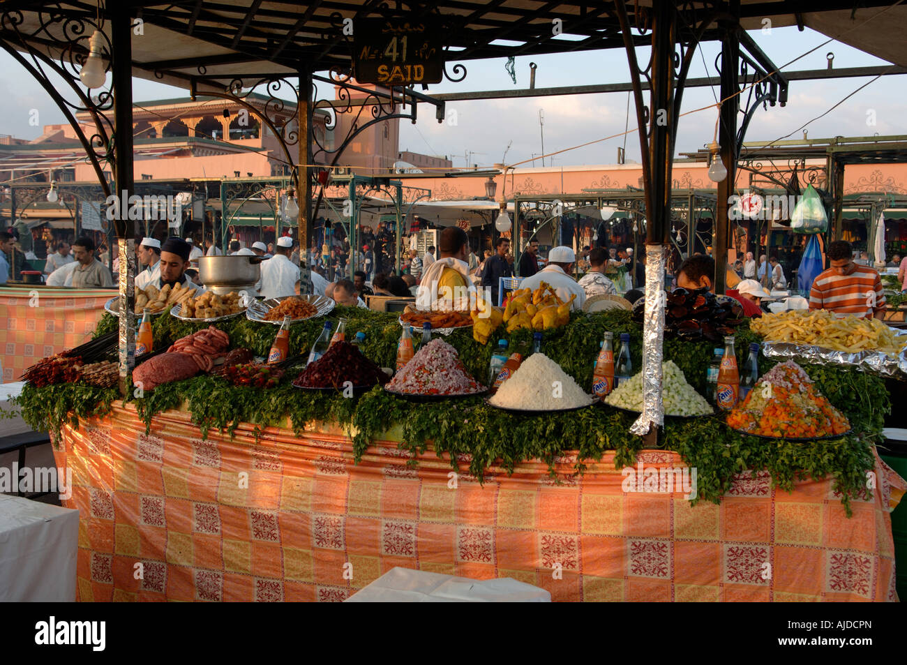 market square comes to life at dusk - Djemaa-el-Fna Marrakech Morocco ...