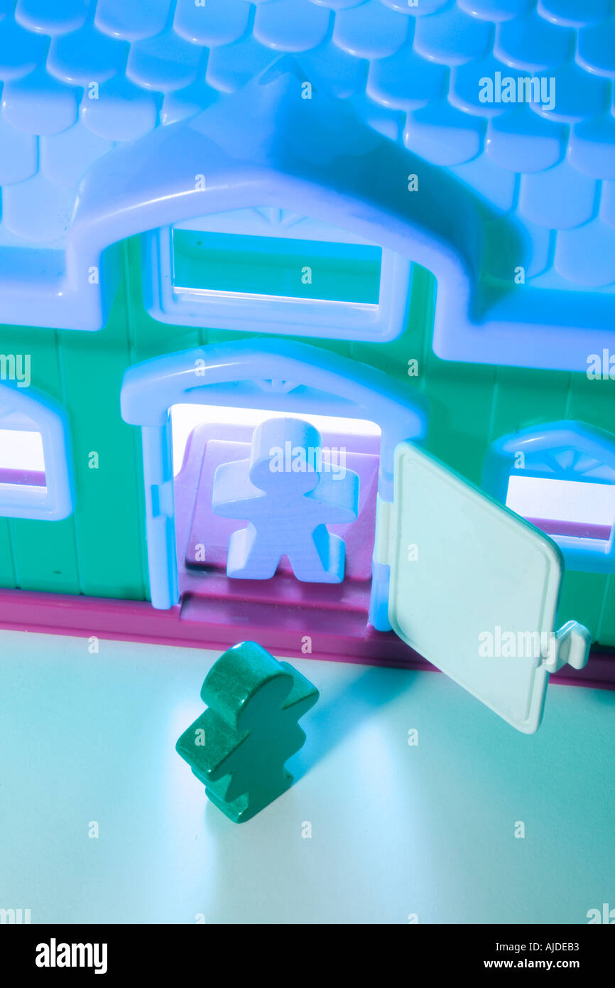 Wooden Children Figures and Toy House Stock Photo - Alamy