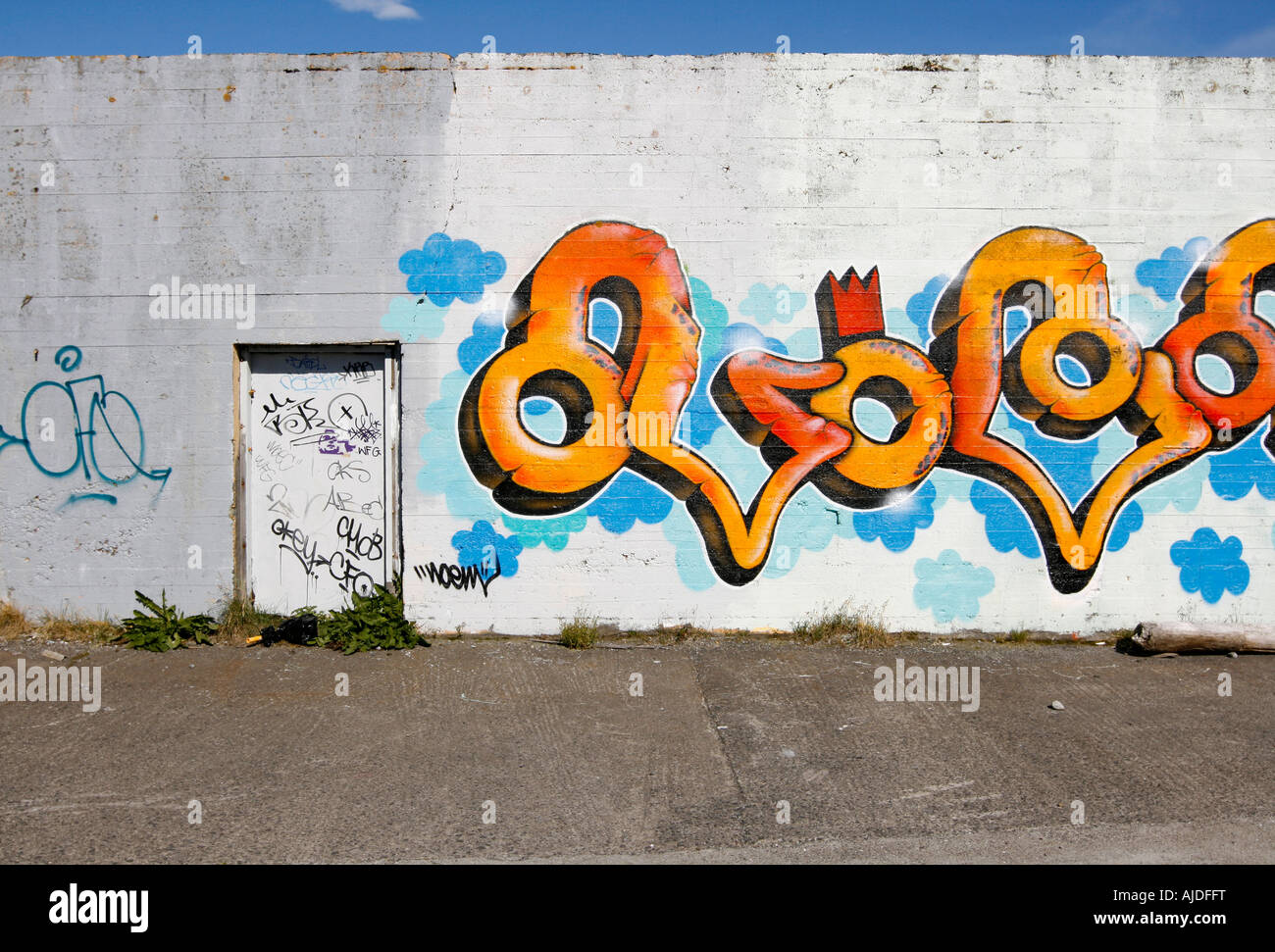 Inner city street scene with colorful graffiti Stock Photo - Alamy