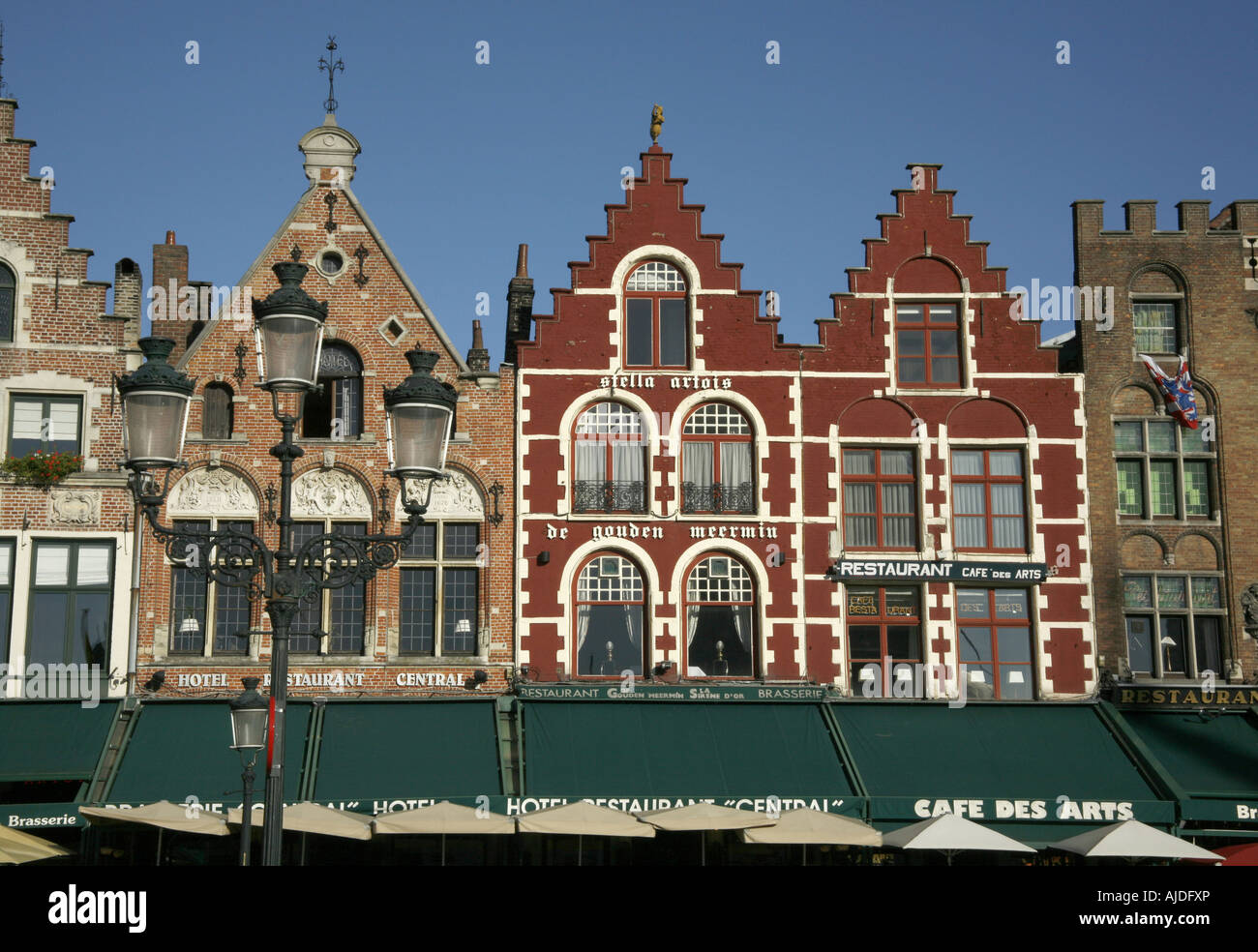 Colourful shop and bar fronts in Bruges, Belgium Stock Photo - Alamy