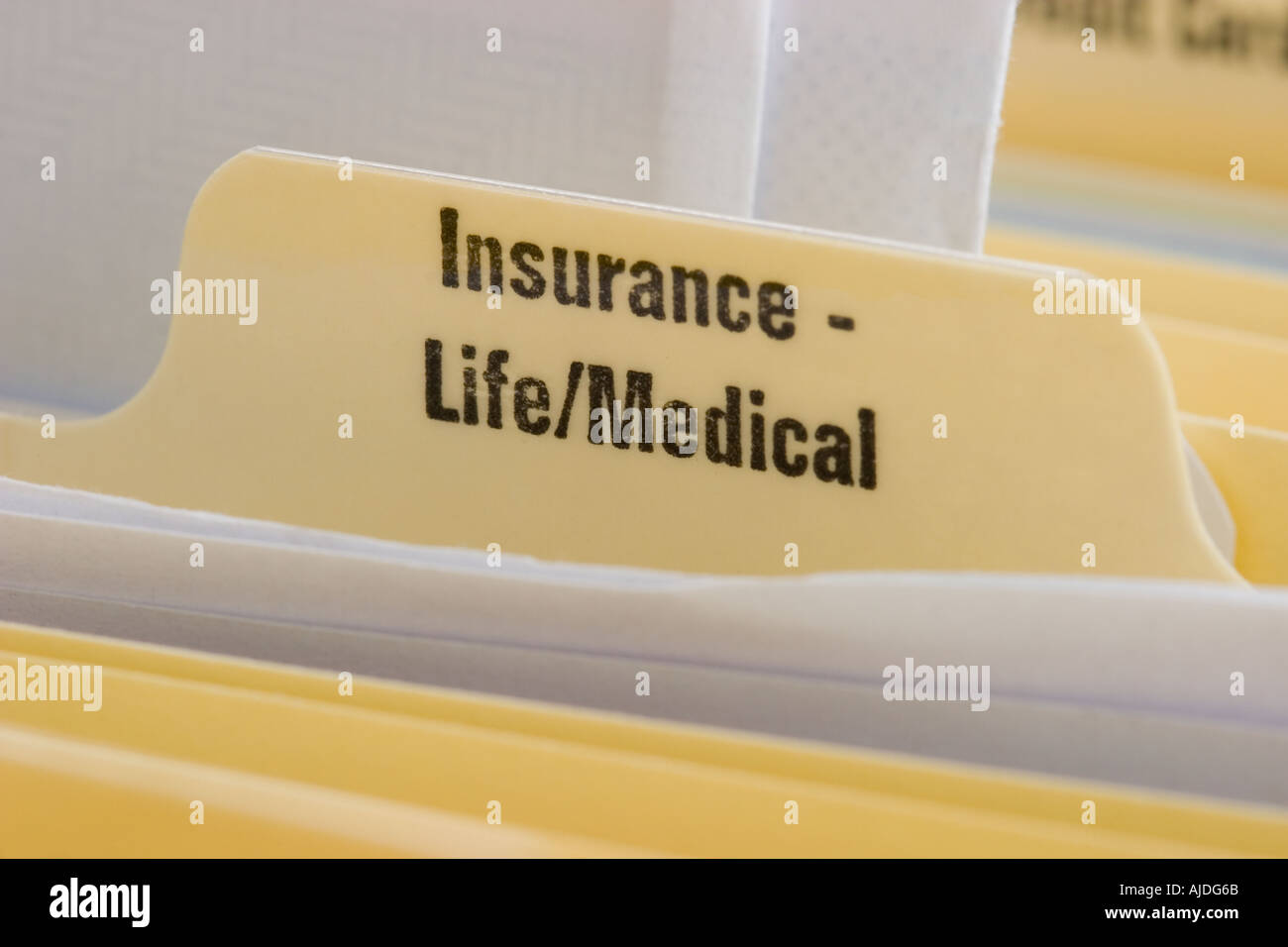 Insurance Life Medical filing tab Stock Photo - Alamy
