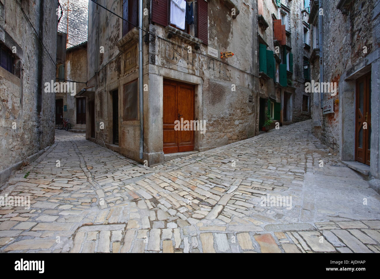 Merging stone walkways in the old city Rovinj. Rovinj sits on the ...