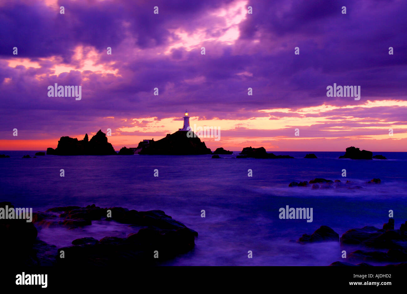 Channel Islands Jersey La Corbiere Point and Lighthouse at dusk Stock ...