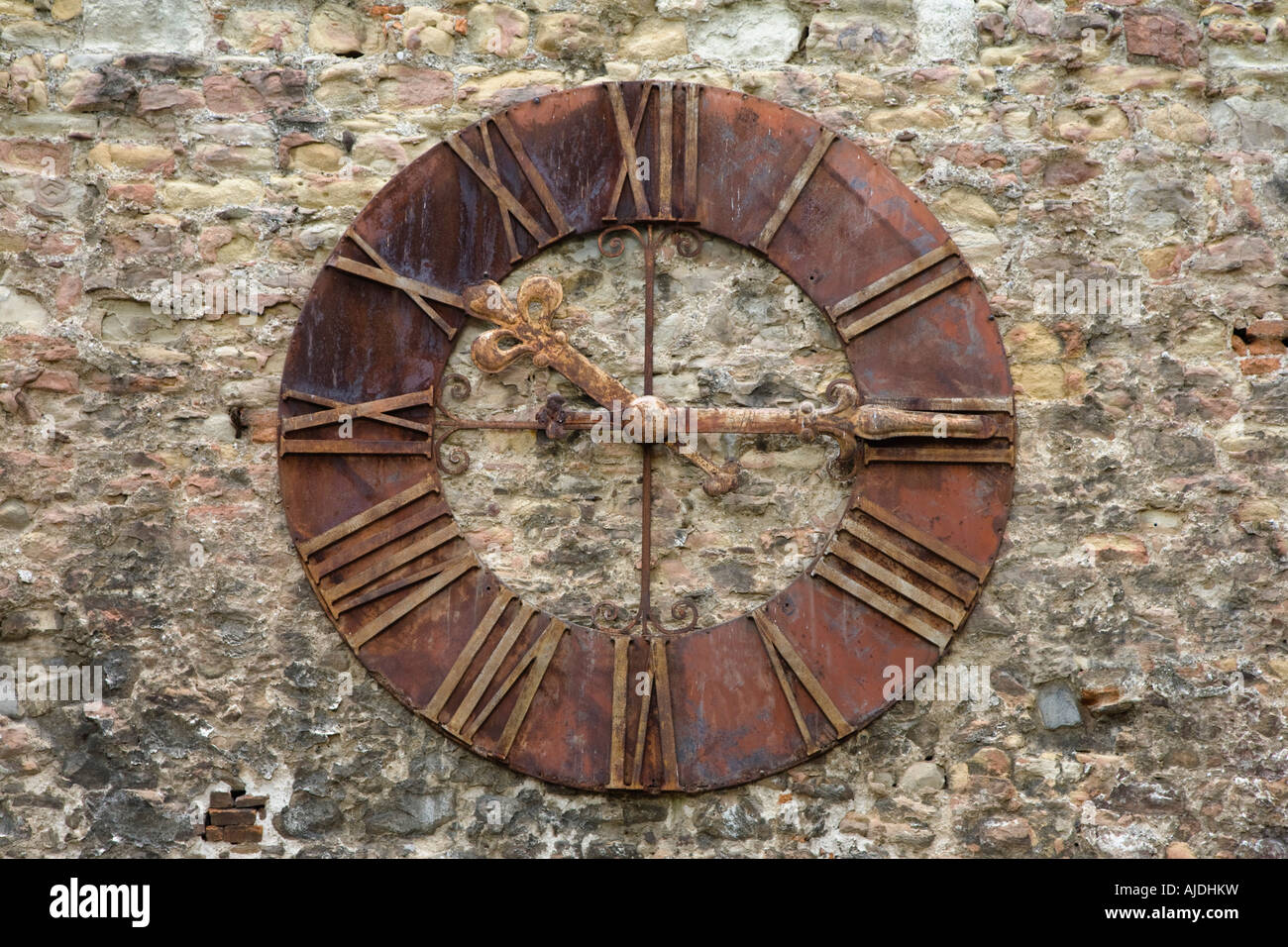 Old clock found on a stone wall in the courtyard of the Cathedral of ...