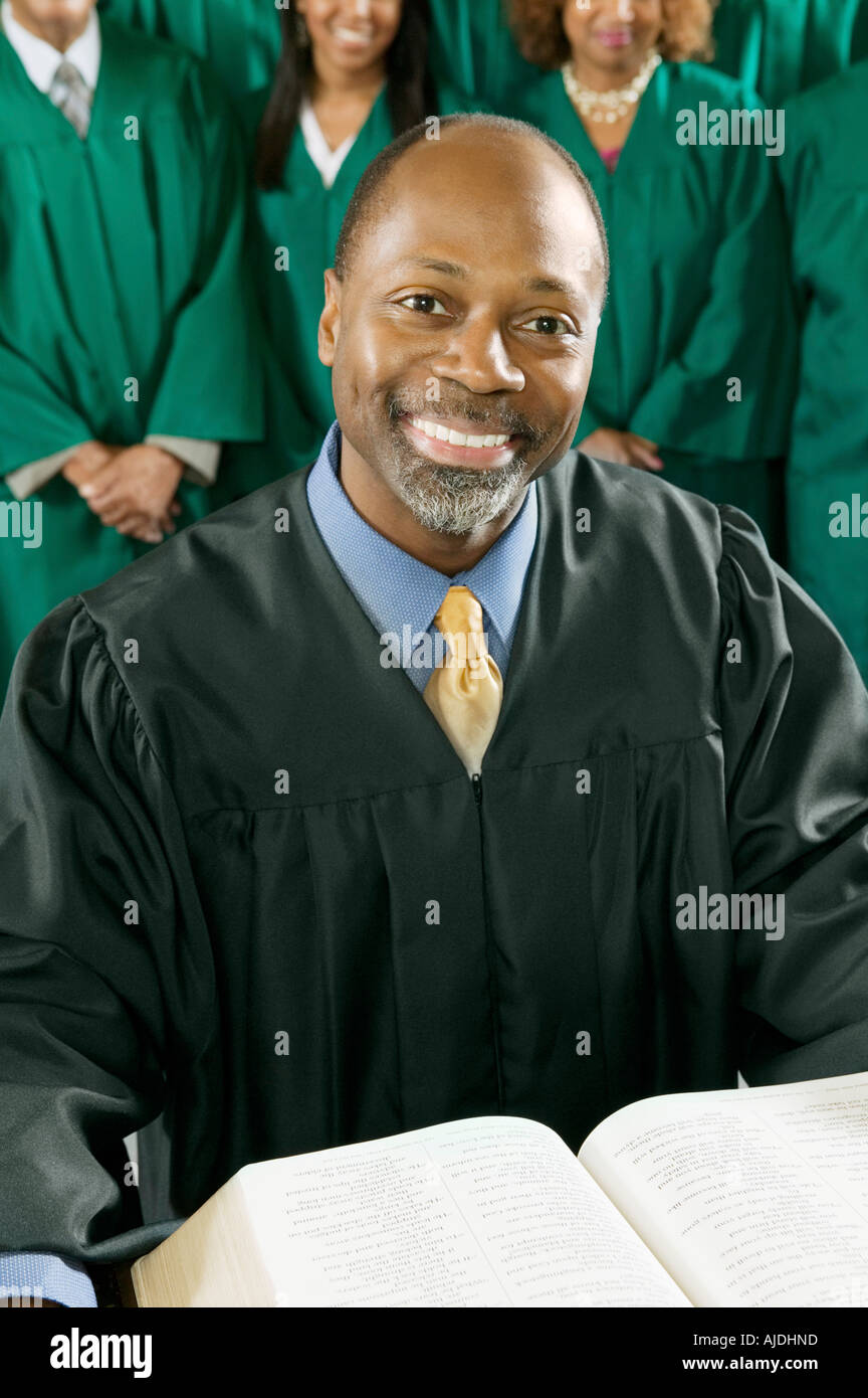 Smiling preacher bible in church hi-res stock photography and images ...