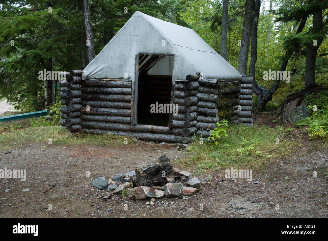 Innu traditional log wood base tent Papinachois Quebec Canada summer ...