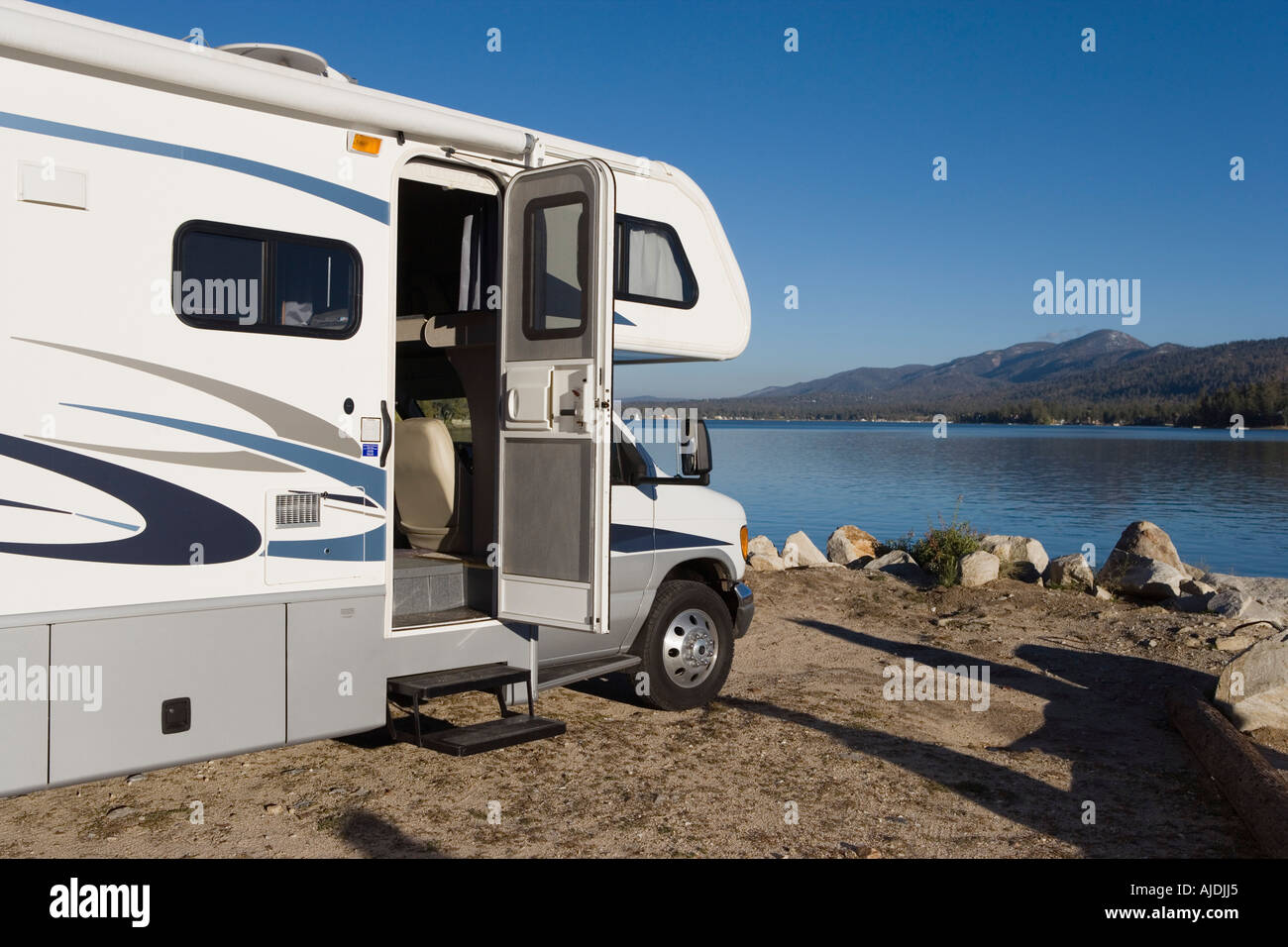 RV by a lake Stock Photo - Alamy