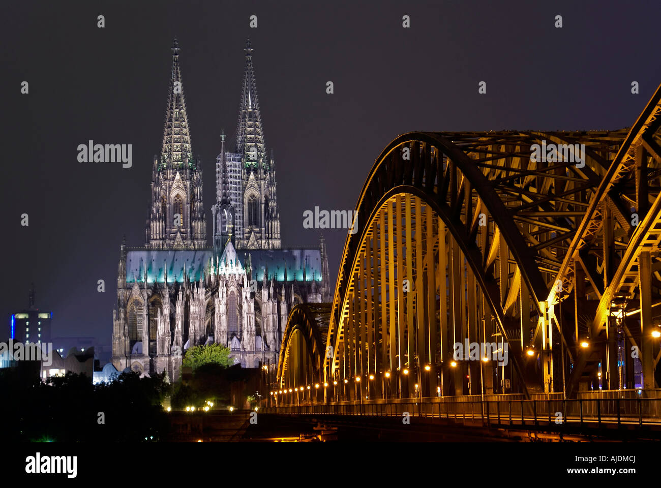 Cologne Cathedral and the Hohenzollern bridge by night Stock Photo - Alamy