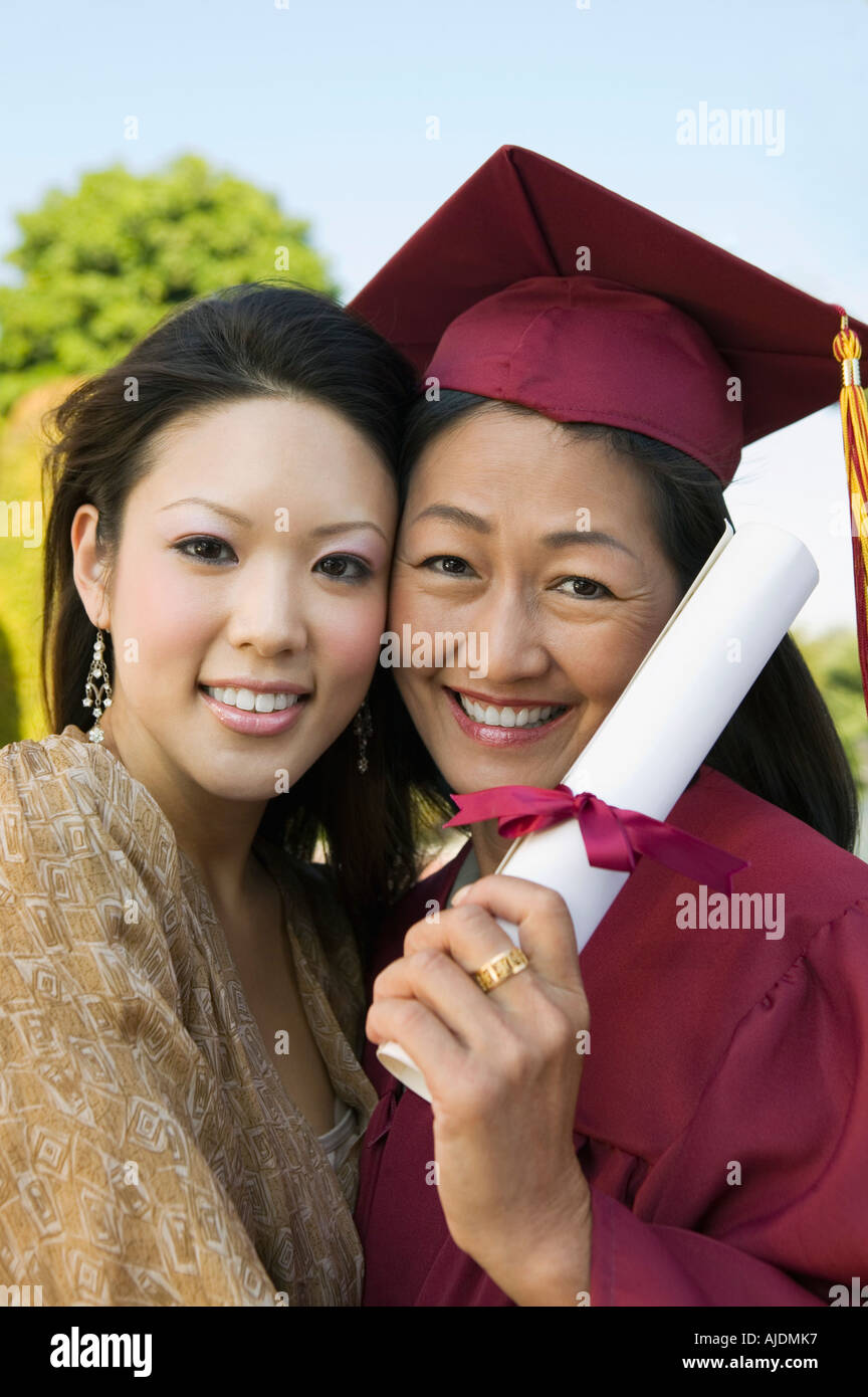 Graduate hugging mother hi-res stock photography and images - Alamy