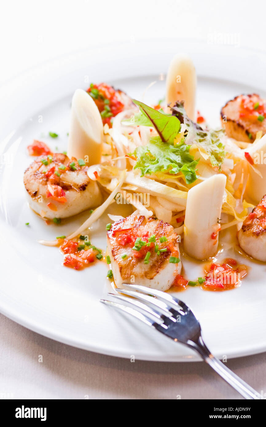Close up of dish garnished with herbs Stock Photo - Alamy