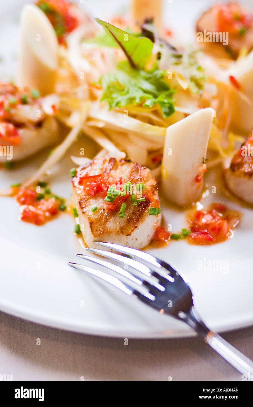 Close up of dish garnished with herbs Stock Photo - Alamy
