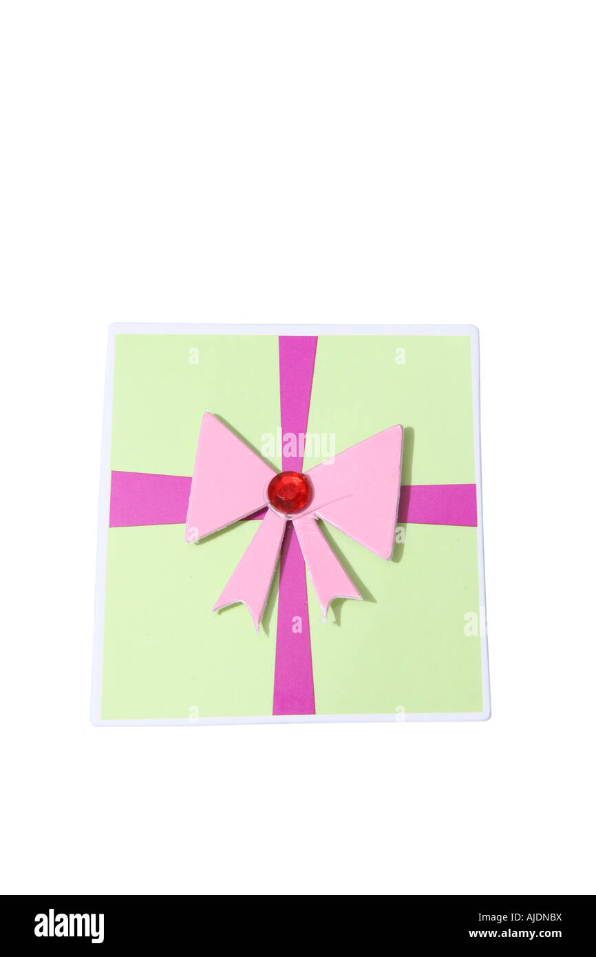 a paper cutout of a wrapped gift isolated on white with clipping path ...
