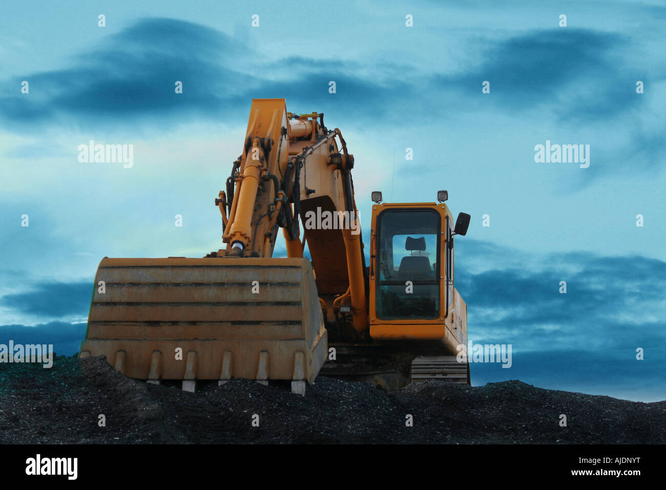 A Big yellow backhoe Stock Photo - Alamy