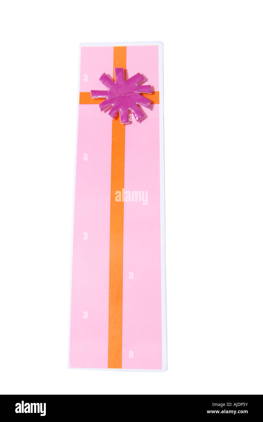 a paper cutout of a wrapped gift isolated on white with clipping path ...