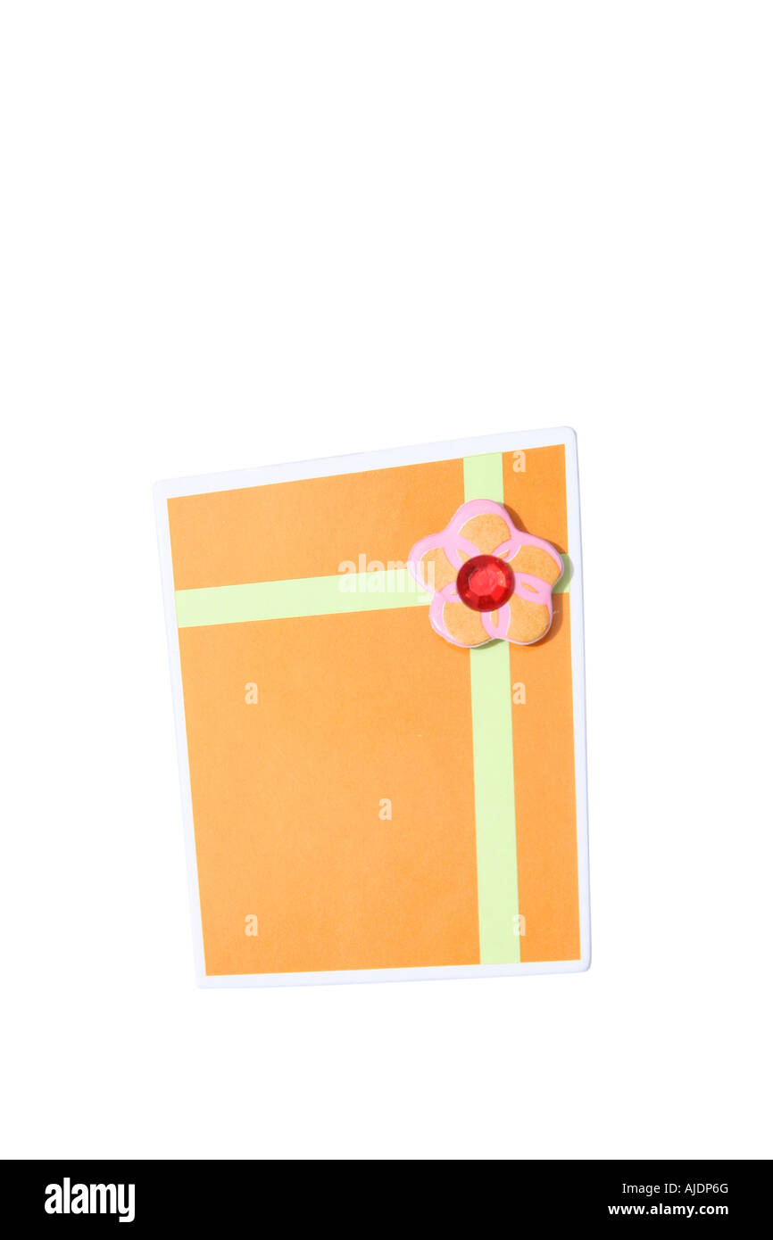 a paper cutout of a wrapped gift isolated on white with clipping path ...