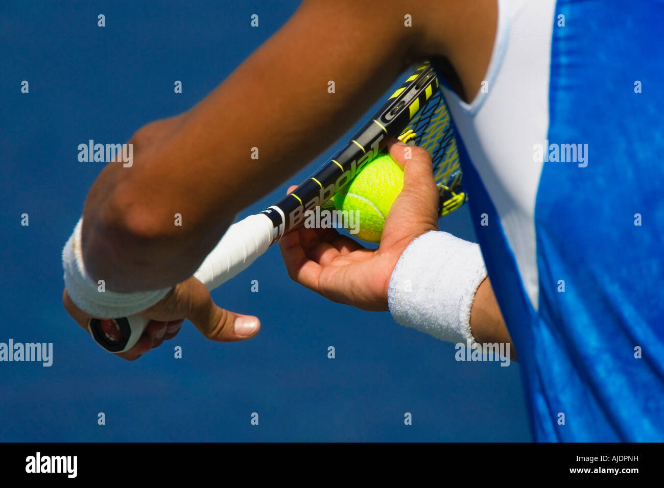 Tennis player prepares to serve ball to opponent Stock Photo - Alamy