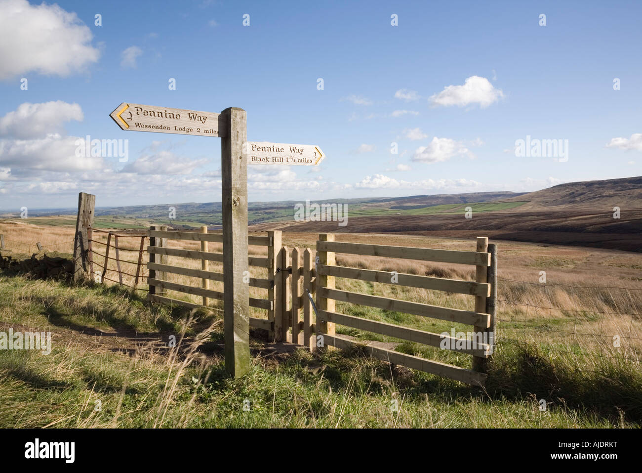 Pennine Way signpost pointing Black Hill & footpath gate in Peak ...