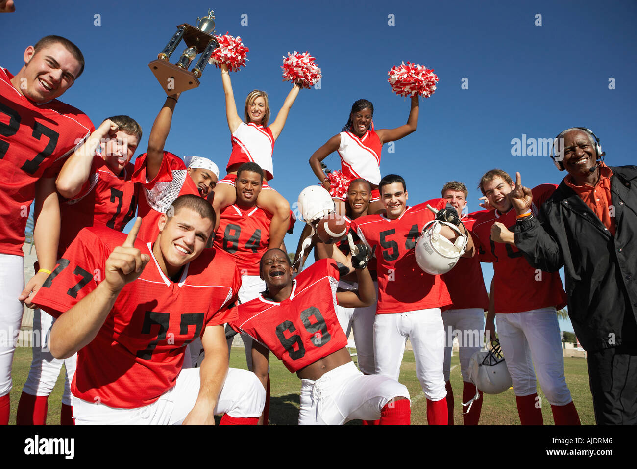 Players hoisting trophy hi-res stock photography and images - Alamy