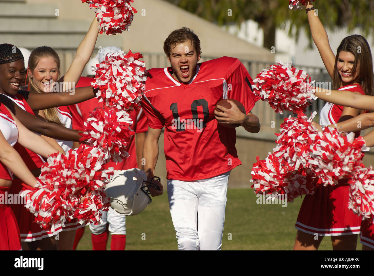 Football player with cheerleader hi-res stock photography and images ...