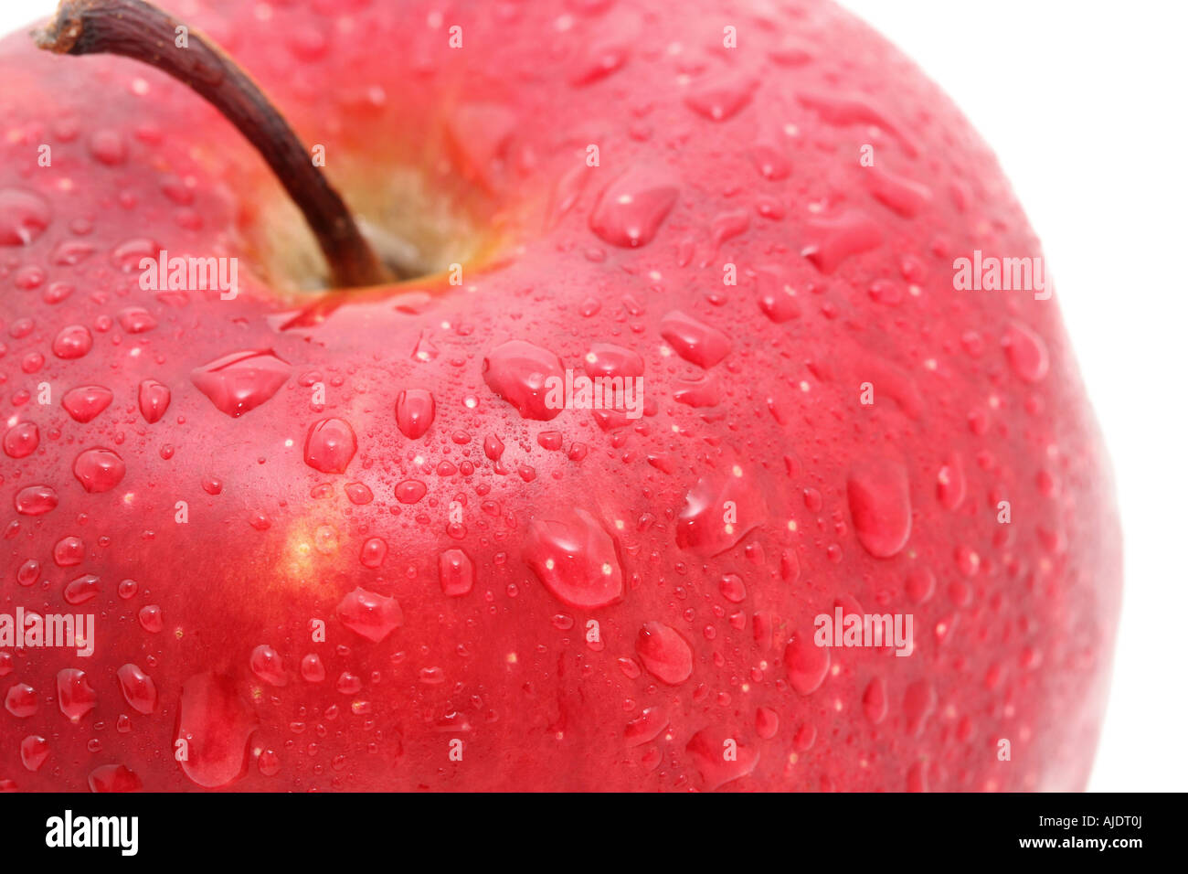 A close up of a red apple isolated on white water drops on apple Stock ...