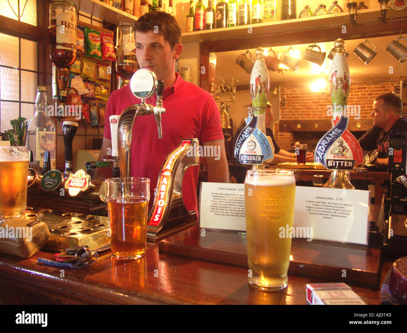 Barman pulling drink hi-res stock photography and images - Alamy