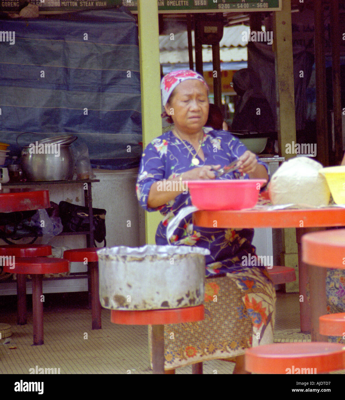 Woman preparing food at a food stall Singapore 1985 Stock Photo - Alamy