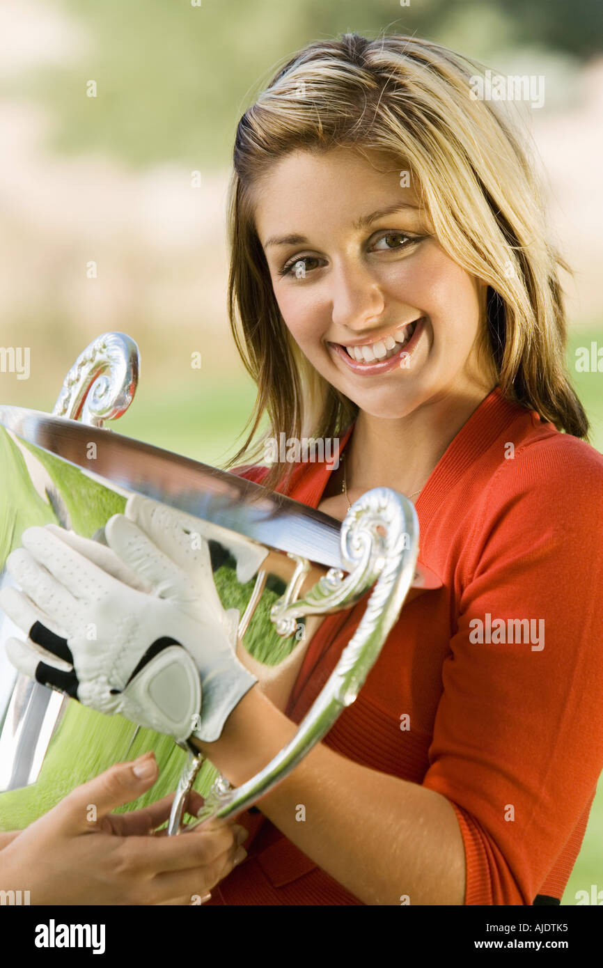 Woman receiving trophy not sport hi-res stock photography and images ...