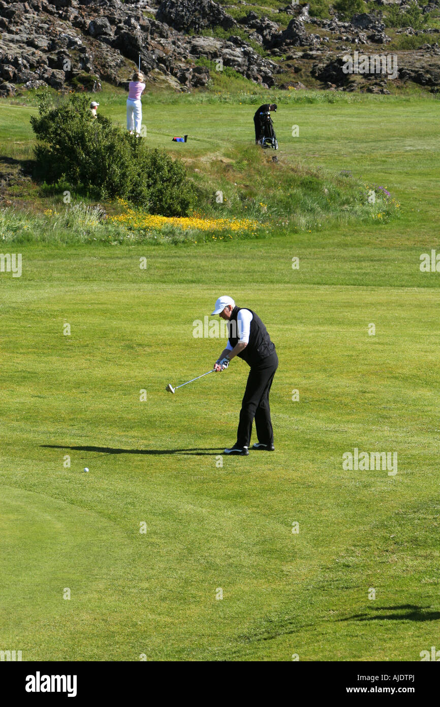 Professional golfer watching ball hi-res stock photography and images ...