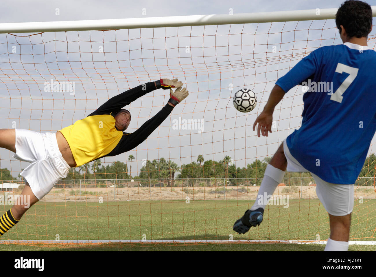 Goalkeeper reaching ball hi-res stock photography and images - Alamy