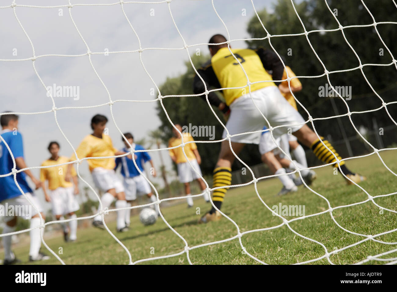 Goalkeeper through net hi-res stock photography and images - Alamy