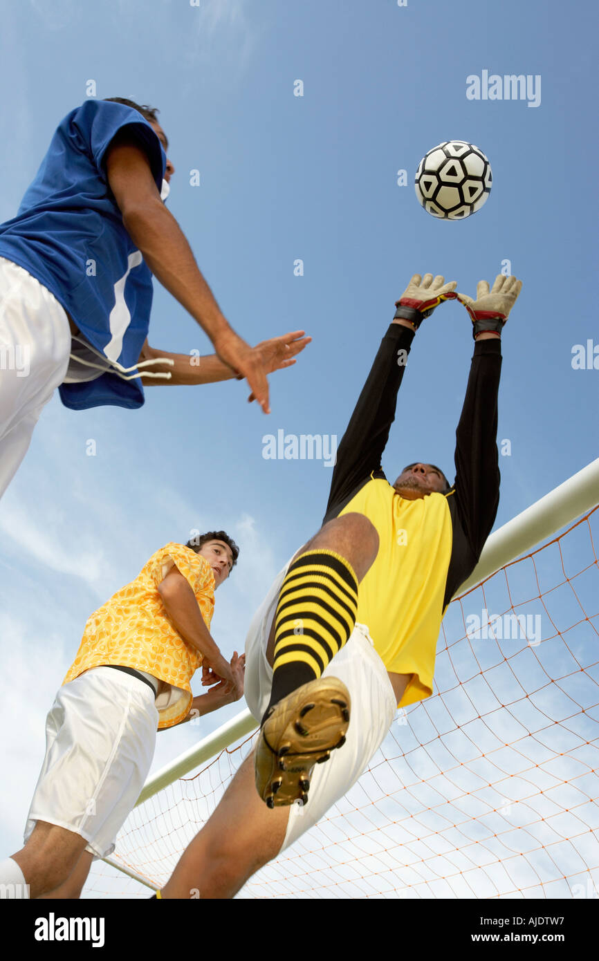 Soccer Goalie Saving the Ball Stock Photo - Alamy