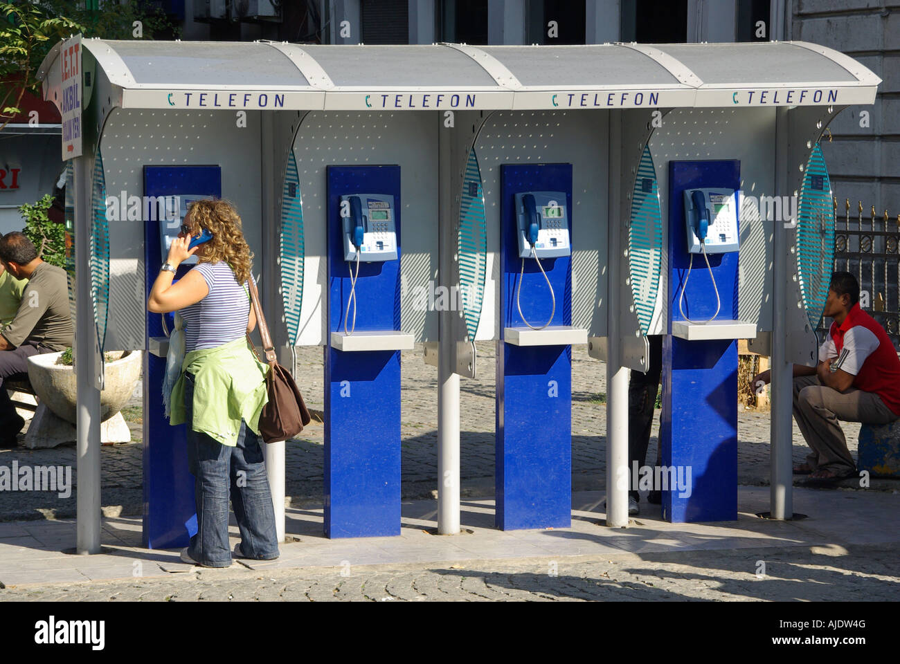 Public telephone candid hi-res stock photography and images - Alamy