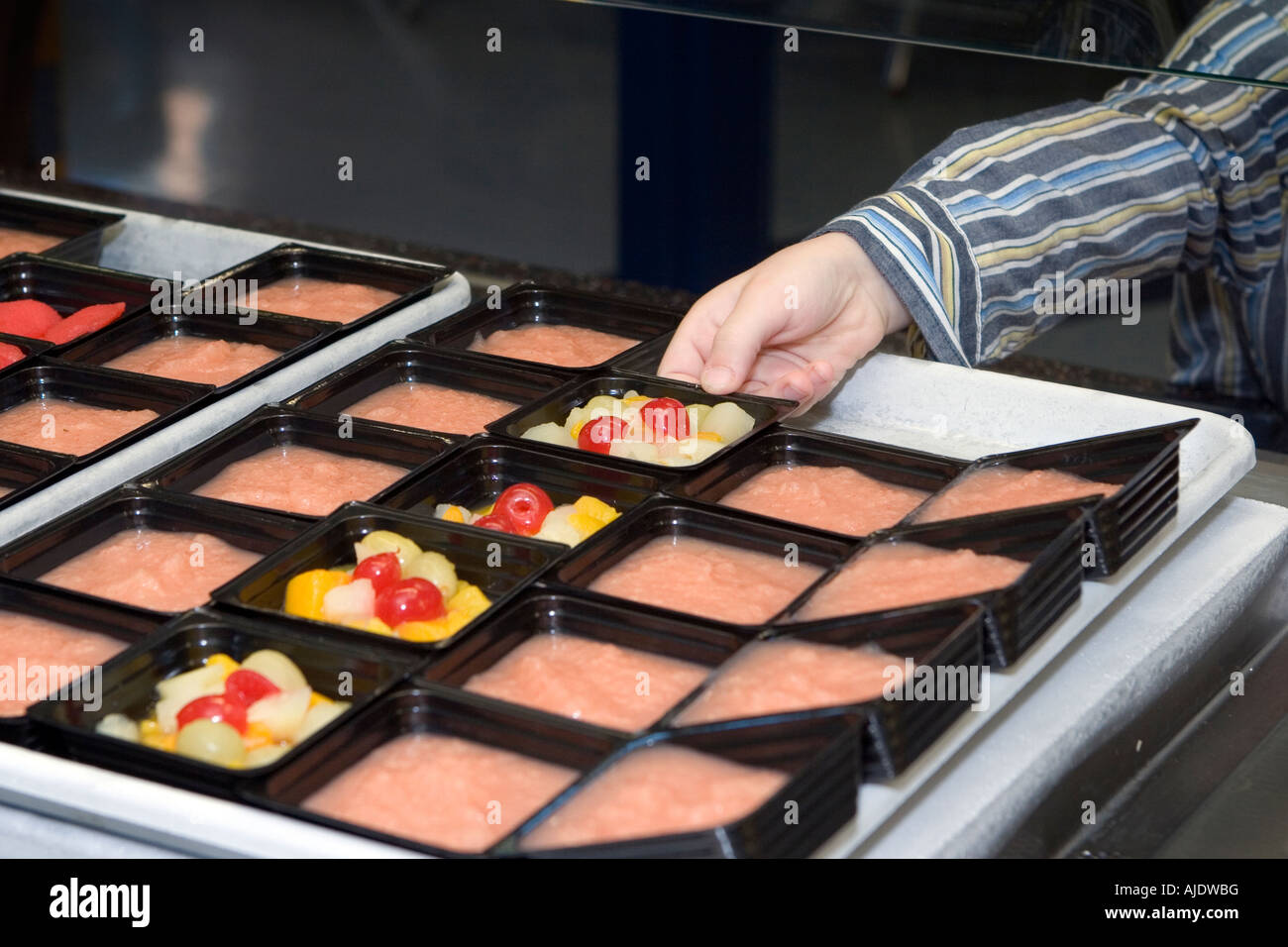 Students choose fruit at lunch in the school cafeteria Stock Photo - Alamy