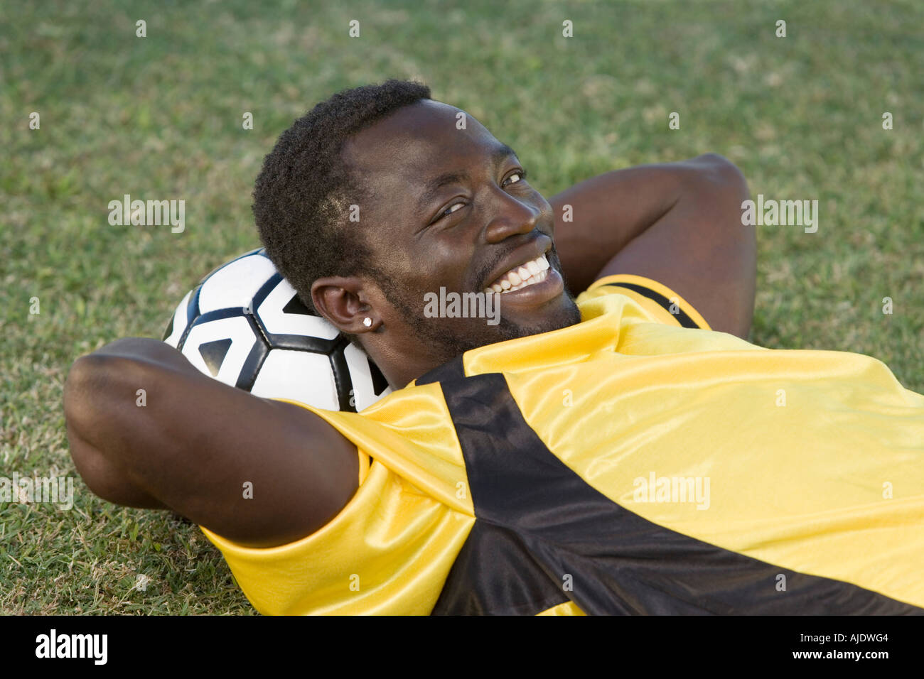 Soccer player lying down hi-res stock photography and images - Alamy