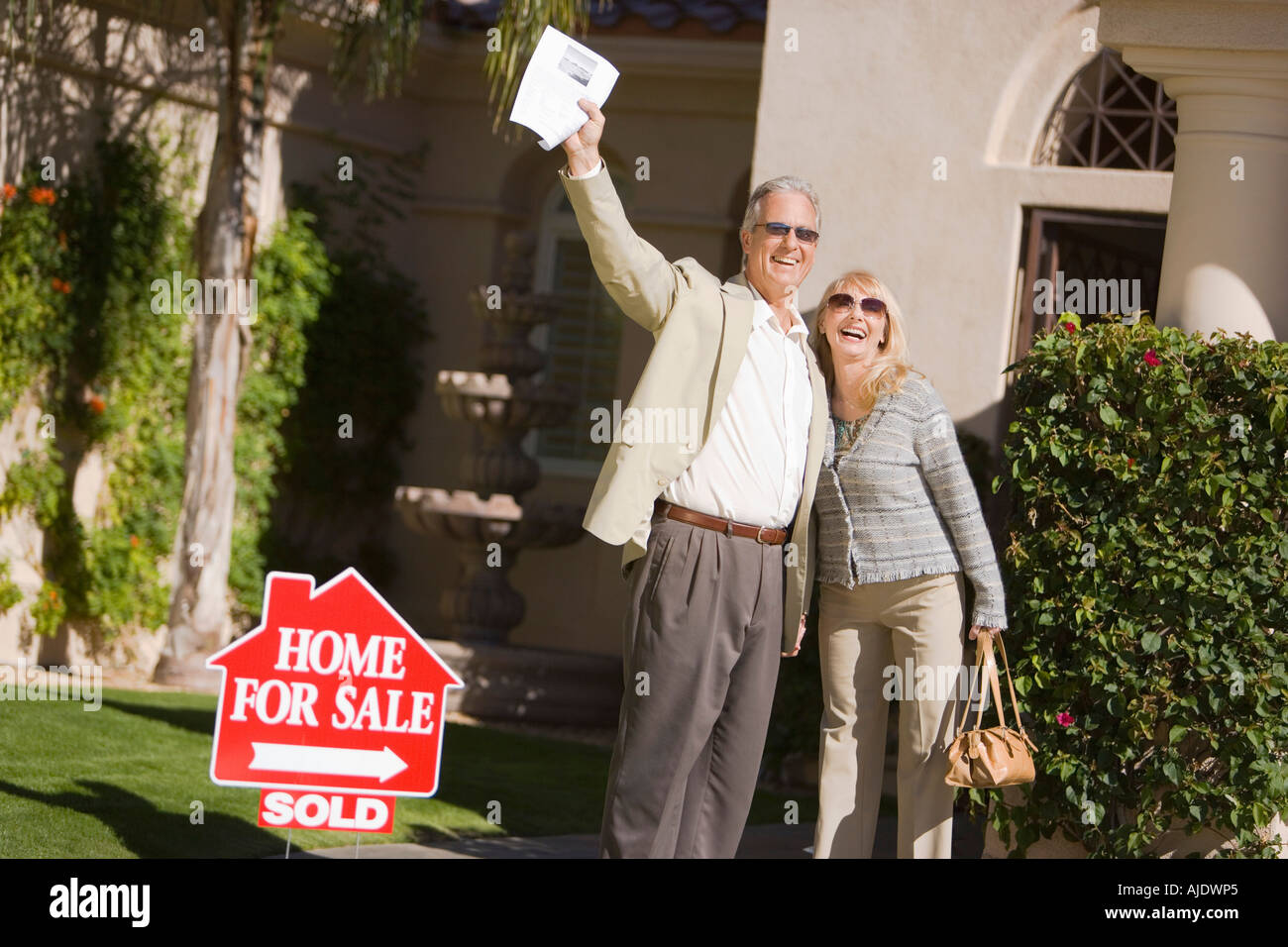Happy new home owners, portrait Stock Photo - Alamy