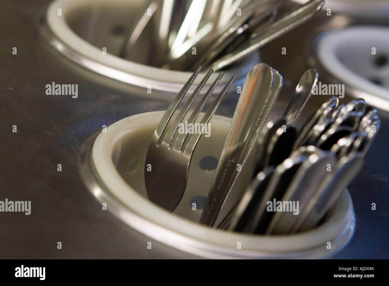 Fork knifes and spoon utensils used in school cafeteria and kitchen ...