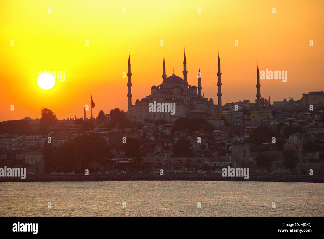 Full sun & sunset over the Sultan Ahmet Mosque or Blue Mosque with six ...
