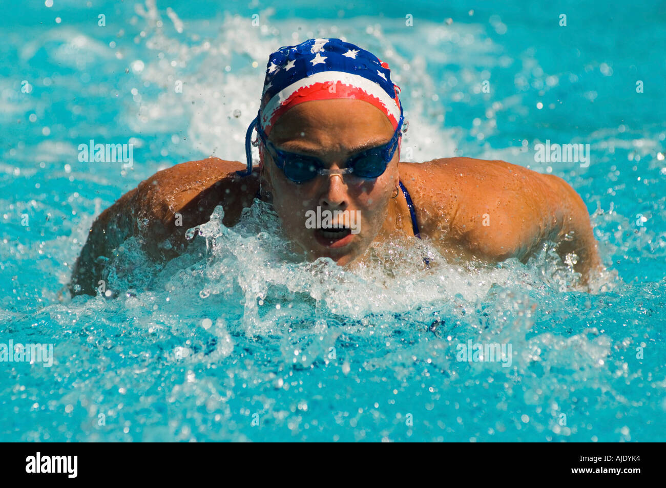 Woman swimming butterfly stroke hi-res stock photography and images - Alamy