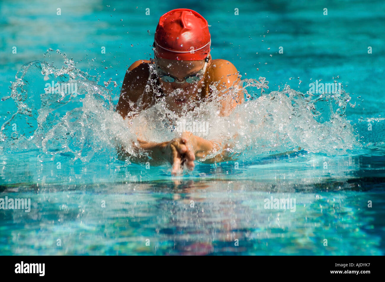 Woman swimming in pool Stock Photo - Alamy