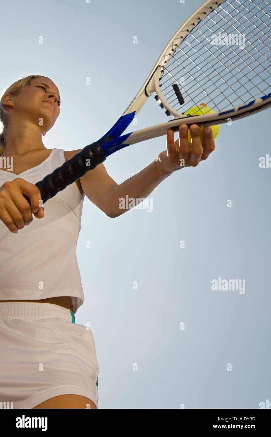 Tennis Player holding ball and racket Preparing to Serve, low angle ...