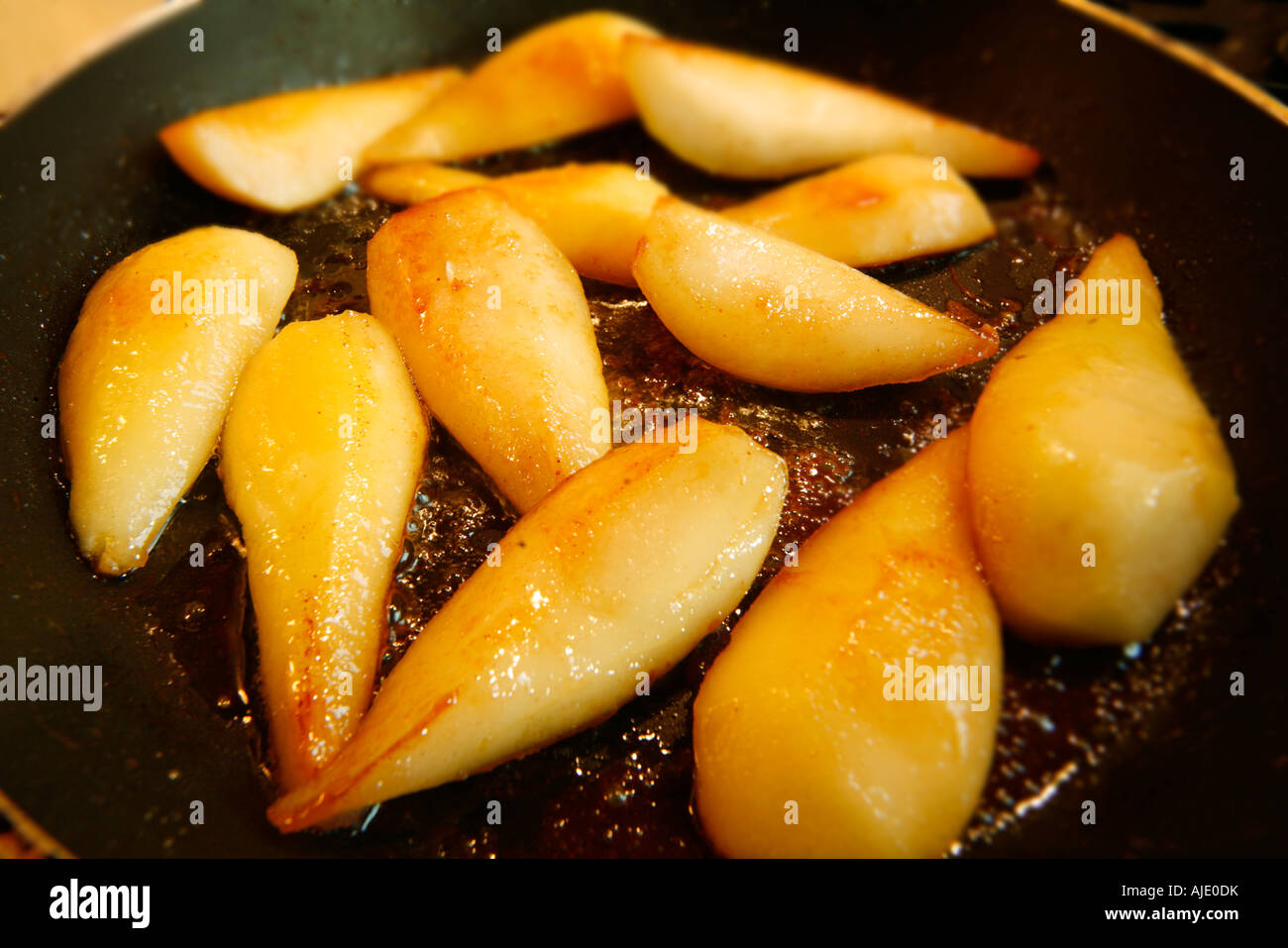 Pears Frying in Caramelised Sugar Stock Photo - Alamy