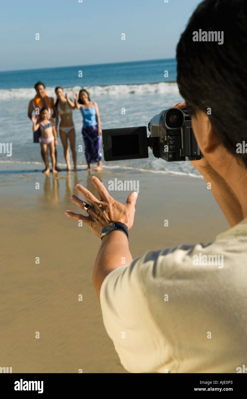 Man is filming hi-res stock photography and images - Alamy